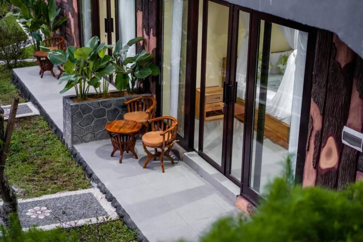 Quarto, vista para o jardim | Varanda