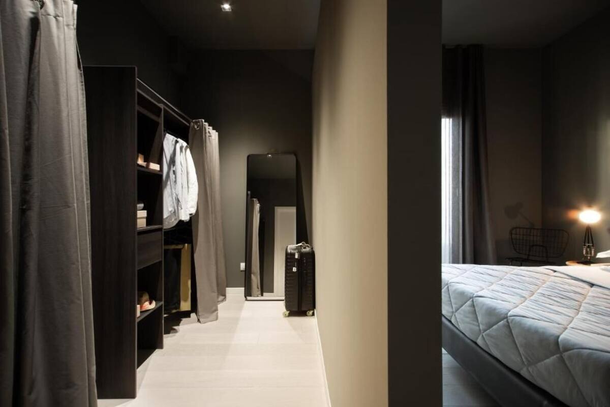 Apartamento Deluxe, 2 quartos (Attico Deluxe) | Cortinas/cortinados opacos, quartos insonorizados