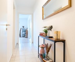 Condo luxo, sacada, vista para o jardim | Parte interna