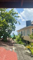 Quarto solteiro luxo, sacada, vista para o mar | Área da propriedade