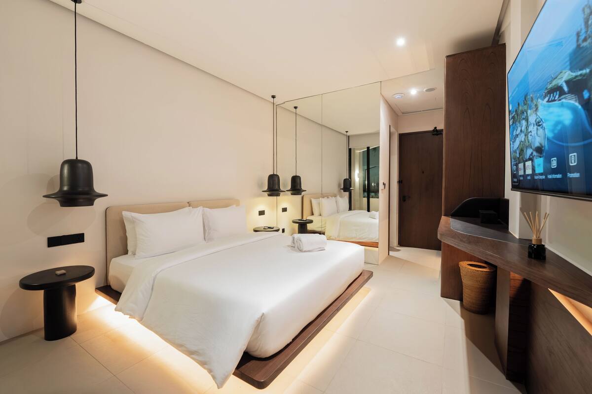 Minibar, ferro/tábua de engomar, Wi-fi grátis, roupa de cama fornecida