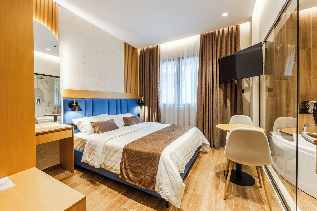 Quarto casal luxo | Área de estar