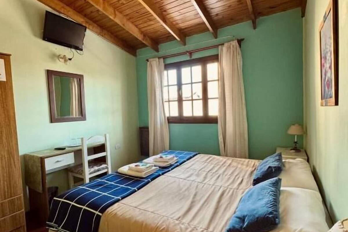 Quarto Duplo ou Twin Deluxe, pátio, vista para o jardim | Wi-fi grátis 