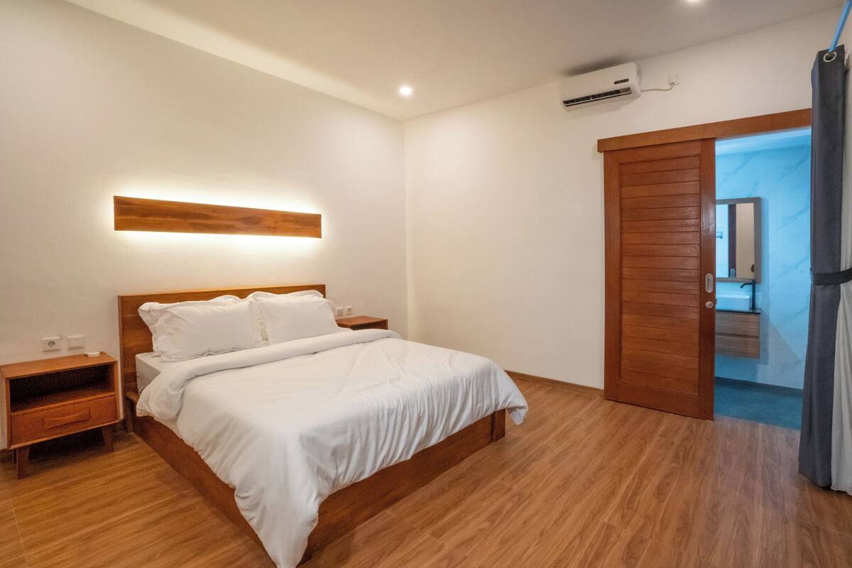 Vila conforto, 1 quarto, cozinha americana, vista para o jardim | Cofres nos quartos, Wi-Fi de cortesia