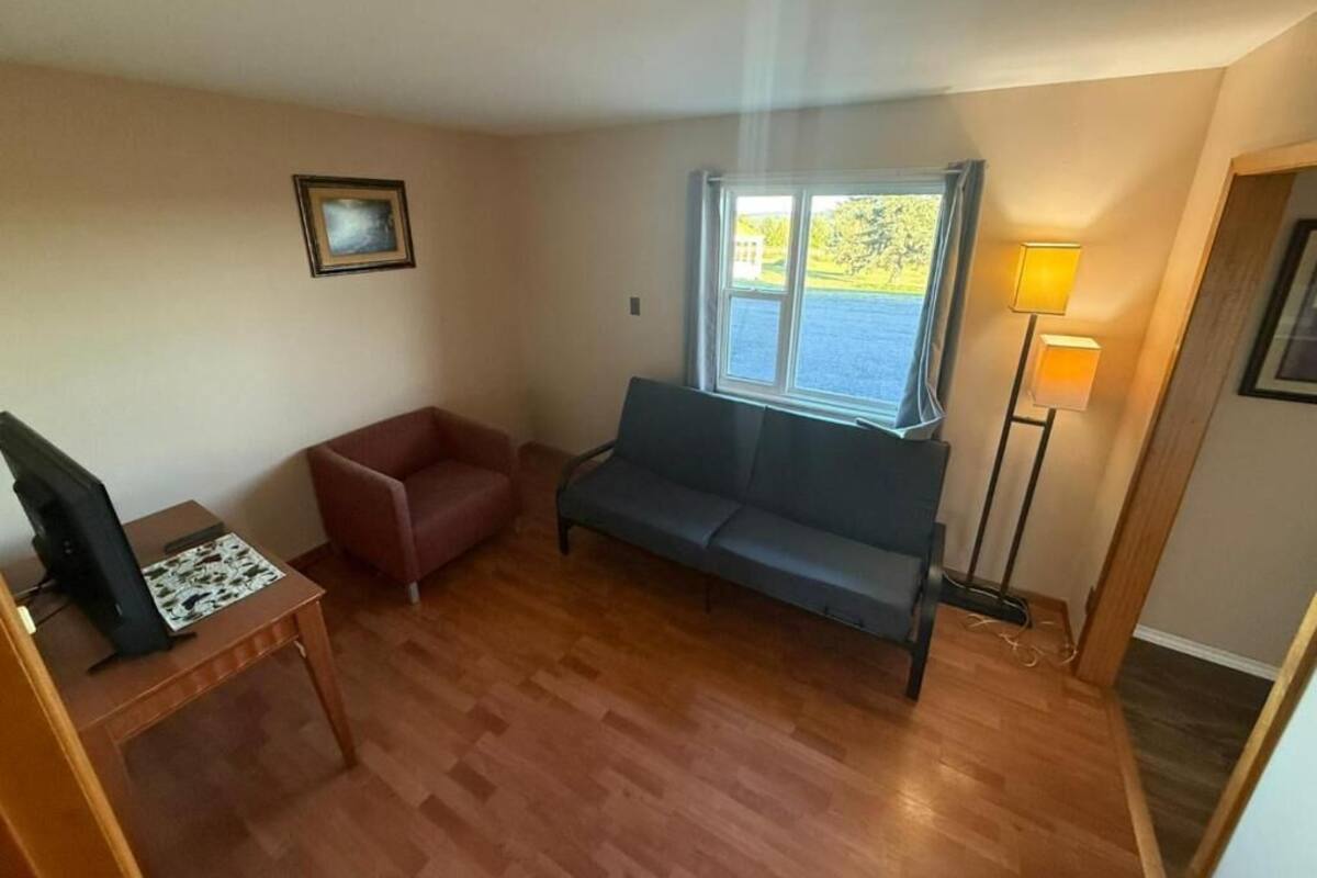 Apartamento conforto, vista para a montanha | Área de estar