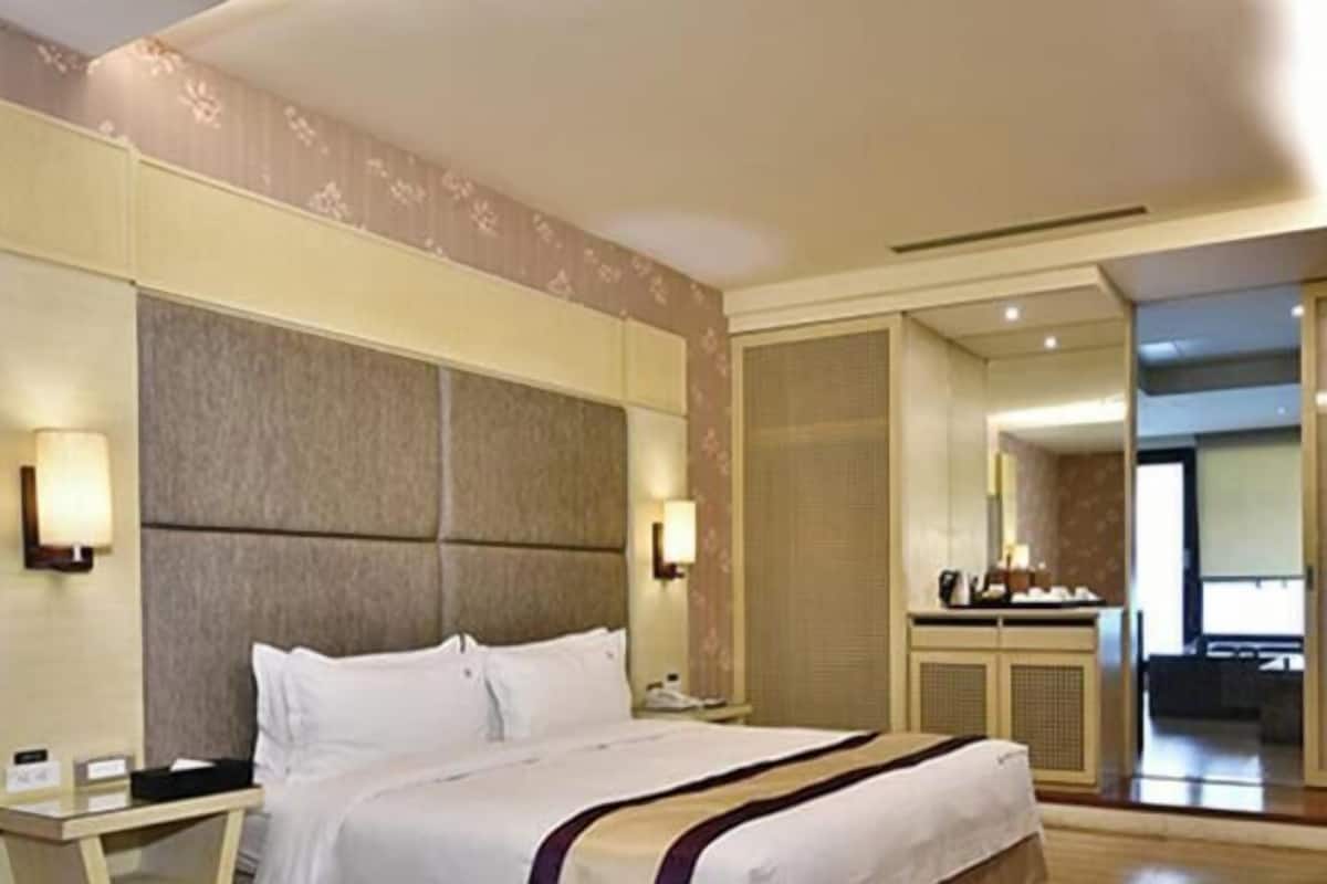 Quarto Quádruplo Standard, varanda, vista para o jardim | Cofre no quarto, cortinas/cortinados opacos, quartos insonorizados 