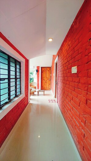 Quarto triplo família, vista para o jardim | Parte interna