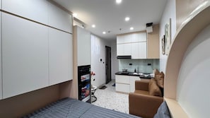Quarto casal, sacada, vista para a cidade