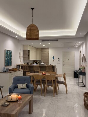 Apartamento conforto, vista para o mar | Parte interna
