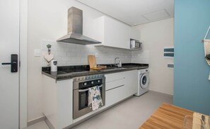 Apartamento, Vista para a cidade | Cozinha privada