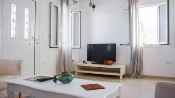 Apartamento superior | Área de estar