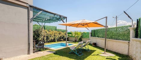 Villa, 2 quartos, acessível, fumadores | Terrenos do alojamento