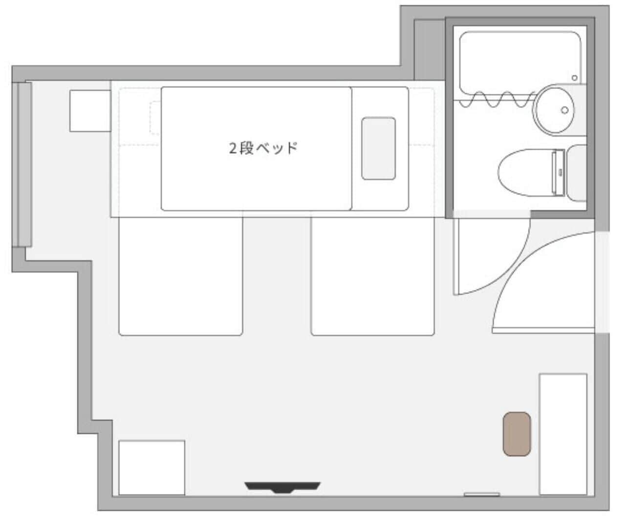 Planta baixa de um hotel com uma unidade de dois quartos, um banheiro e uma cozinha compacta.