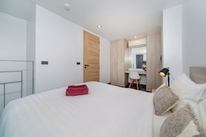 Cofres nos quartos, cortinas blackout, Wi-Fi de cortesia