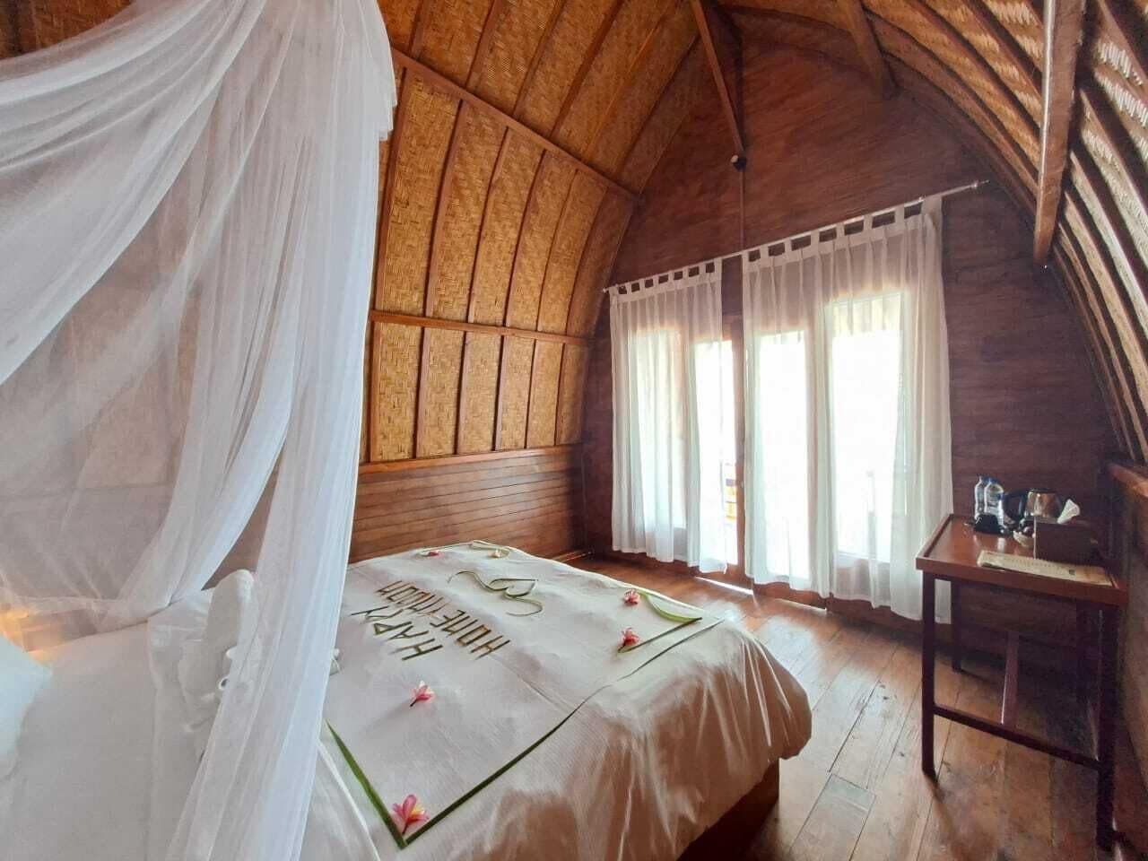 Quarto casal, vista para o mar | Frigobar, Wi-Fi de cortesia