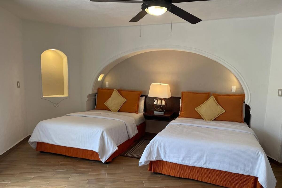 Quarto Standard, vista para o jardim | Cortinas/cortinados opacos, ferro/tábua de engomar, Wi-fi grátis 