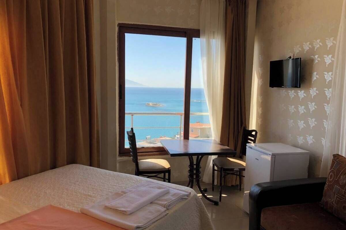 Quarto Familiar, varanda, vista para o mar | Secretária, Wi-fi grátis 