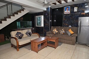 Quarto Deluxe | Sala de estar