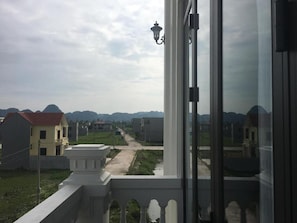 Quarto casal luxo, sacada, vista para a cidade | Terraço/pátio