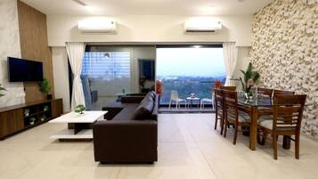 Apartamento, varanda, Vista para a cidade | Sala de estar