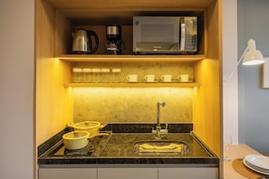 Apartamento Cidade, 1 cama queen-size e sofá-cama, cozinha, Vista para a cidade | Cozinha privada