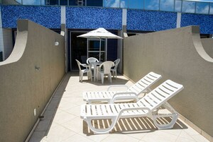Quarto de Luxo, varanda, vista para a praia | Refeições ao ar livre
