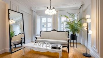 Suite Deluxe, Vista para a cidade | Sala de estar