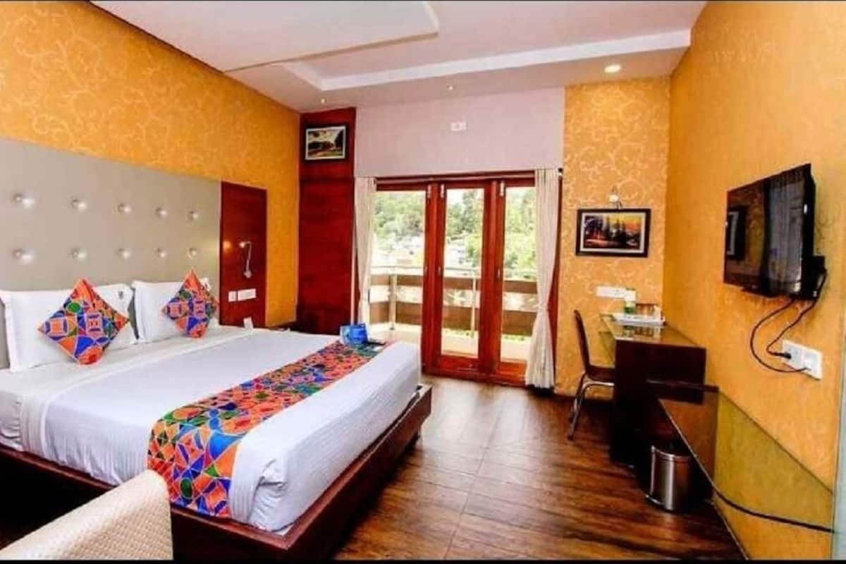 Quarto Duplo Deluxe, varanda, Vista para a cidade | Roupa de alta qualidade, camas de colchão viscoelástico, secretária
