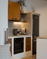 Suite, piscina privativa | Cozinha privada | Uma máquina de café expresso, uma cafeteira/bule, uma chaleira elétrica 