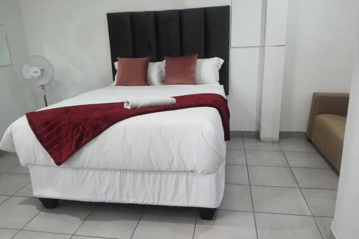 Quarto Deluxe, Vista para a cidade | Ferro/tábua de engomar, Wi-fi grátis 