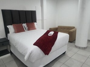 Quarto Deluxe, Vista para a cidade | Ferro/tábua de engomar, Wi-fi grátis 