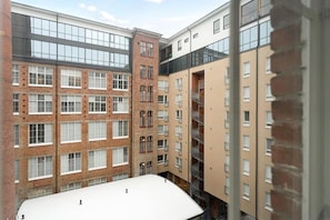 Condo superior, vista para o pátio | Parte interna