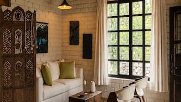 Suíte luxo, vista para o vinhedo | Área de estar
