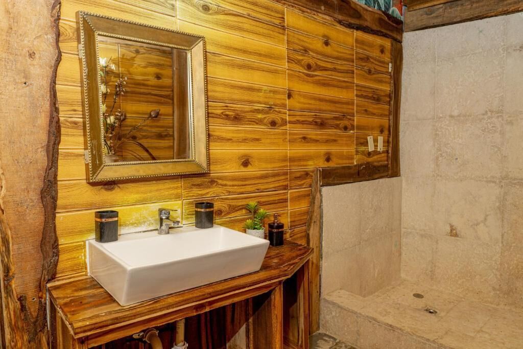 Quarto Duplo Deluxe, vista para o mar | Casa de banho