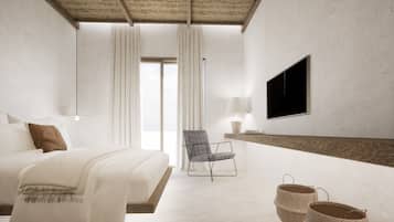 Quarto de hotel moderno com cama, poltrona, televisão e janela.