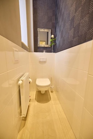 Apartamento superior, vista para a cidade | Banheiro