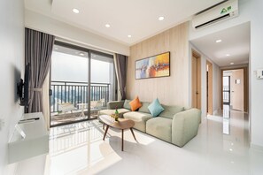 Apartamento, 3 quartos, Vista para a cidade | Sala de estar