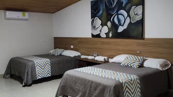 Roupas de cama premium, edredons de pluma, Wi-Fi de cortesia