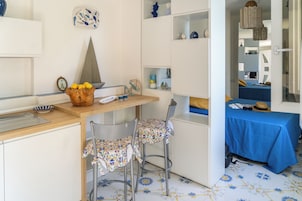 Apartamento, pátio | Ferro/tábua de engomar, Wi-fi grátis 