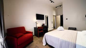 Quarto Triplo Deluxe, varanda, Vista para a cidade | Cofre no quarto, cortinas/cortinados opacos, quartos insonorizados
