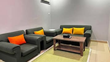 Quarto Deluxe, Vista para a cidade | Sala de estar