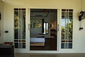 Villa Premium, vista parcial para o oceano | Cofre no quarto, Wi-fi grátis, roupa de cama fornecida 