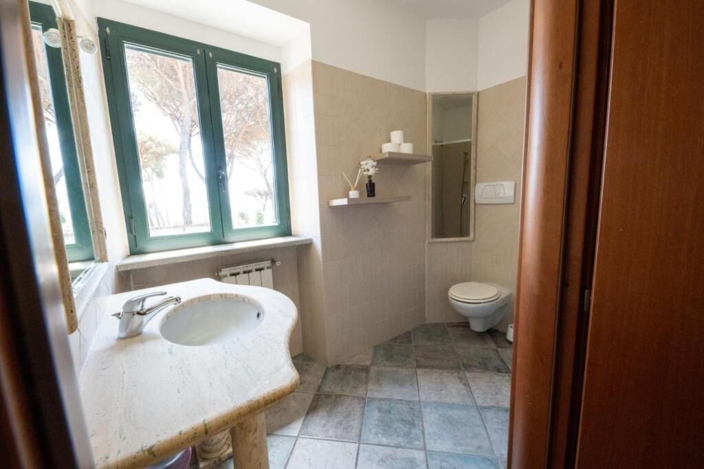 Quarto triplo superior | Banheiro | Chuveiro, secador de cabelo, toalhas de banho, sabonete
