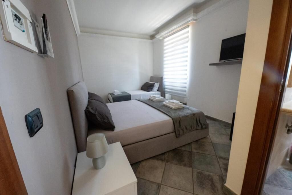 Quarto triplo superior | Cortinas blackout, Wi-Fi de cortesia