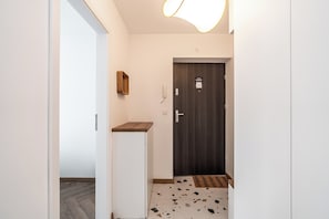Apartamento, vista para a cidade | Área de estar