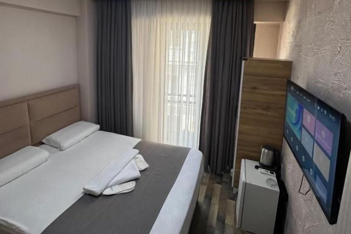 Estúdio Standard | Wi-fi grátis, roupa de cama fornecida 