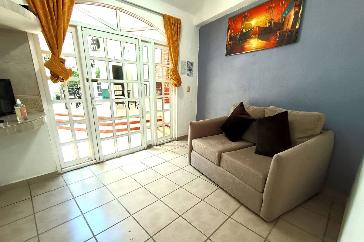 Estúdio Standard, vista para o jardim | Sala de estar