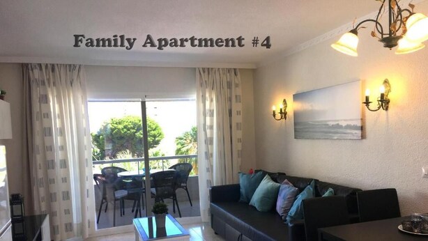 Apartamento família, 2 quartos, vista para a piscina | Área de estar