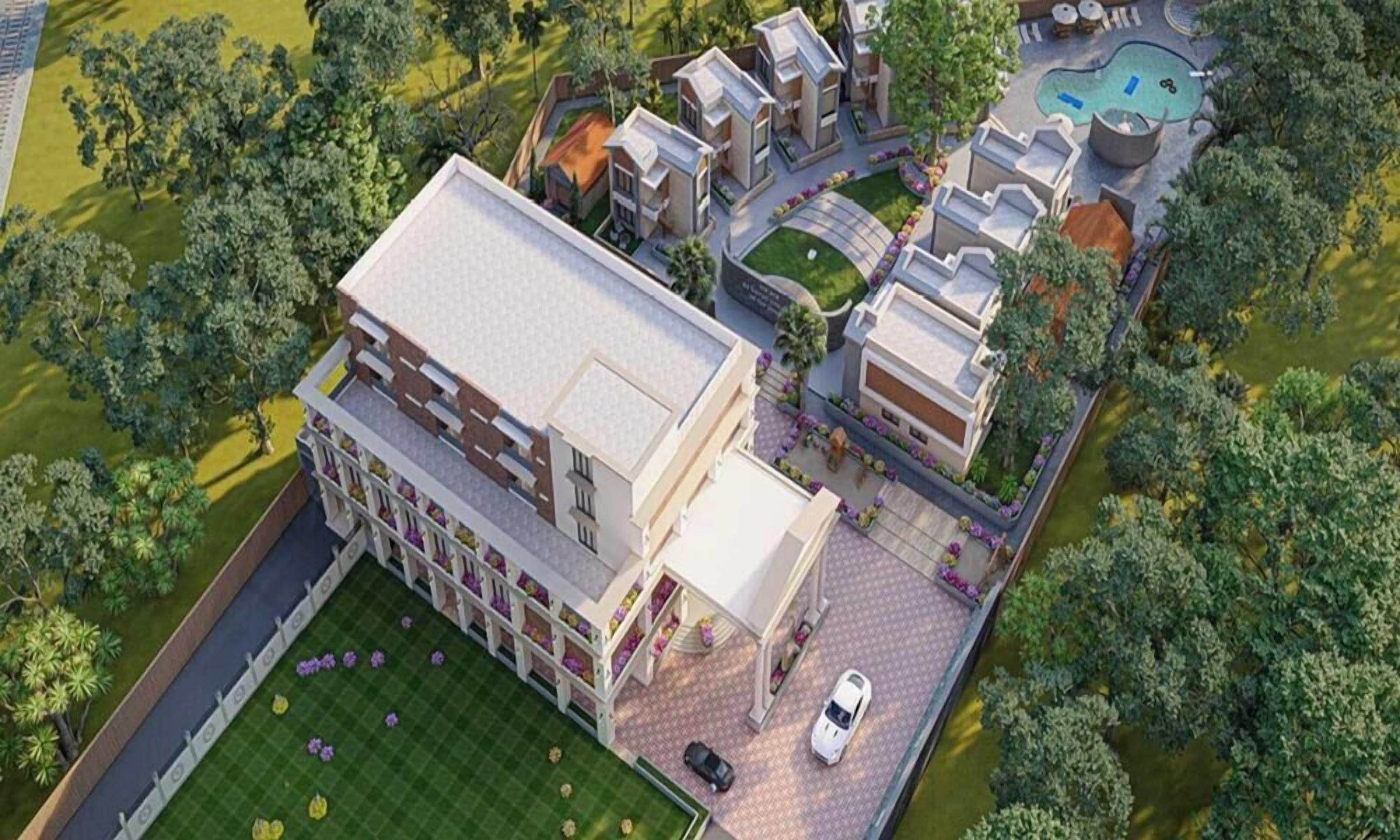 Um complexo hoteleiro moderno com vários edifícios, piscina e jardins bem cuidados.