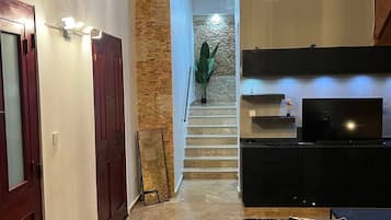 Apartamento, 2 quartos | Área de estar